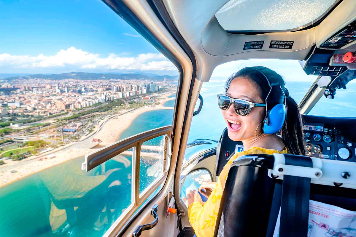 Take a helicopter flight over beautiful Barcelona